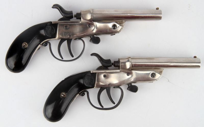 PAIR OF DOUBLE BARREL ROSSI DERRINGERS .22
