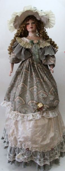 VINTAGE 48 INCH TALL PORCELAIN DOLL W GREEN DRESS