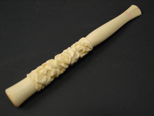 010B: Antique Carved Ivory Cigarette Holder Bat with fl
