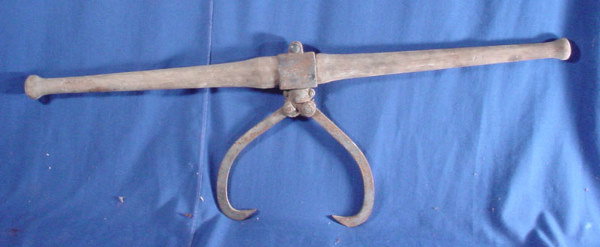 1066: Two Man Ice Tongs with wooden handle.