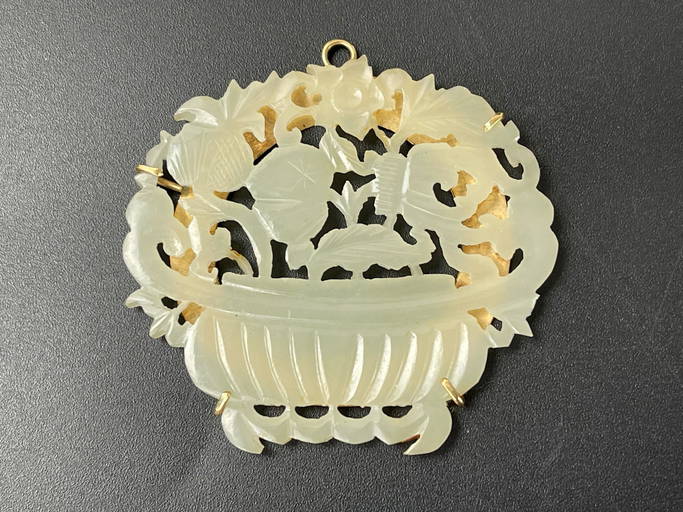 A Chinese Caving Jade Pendant