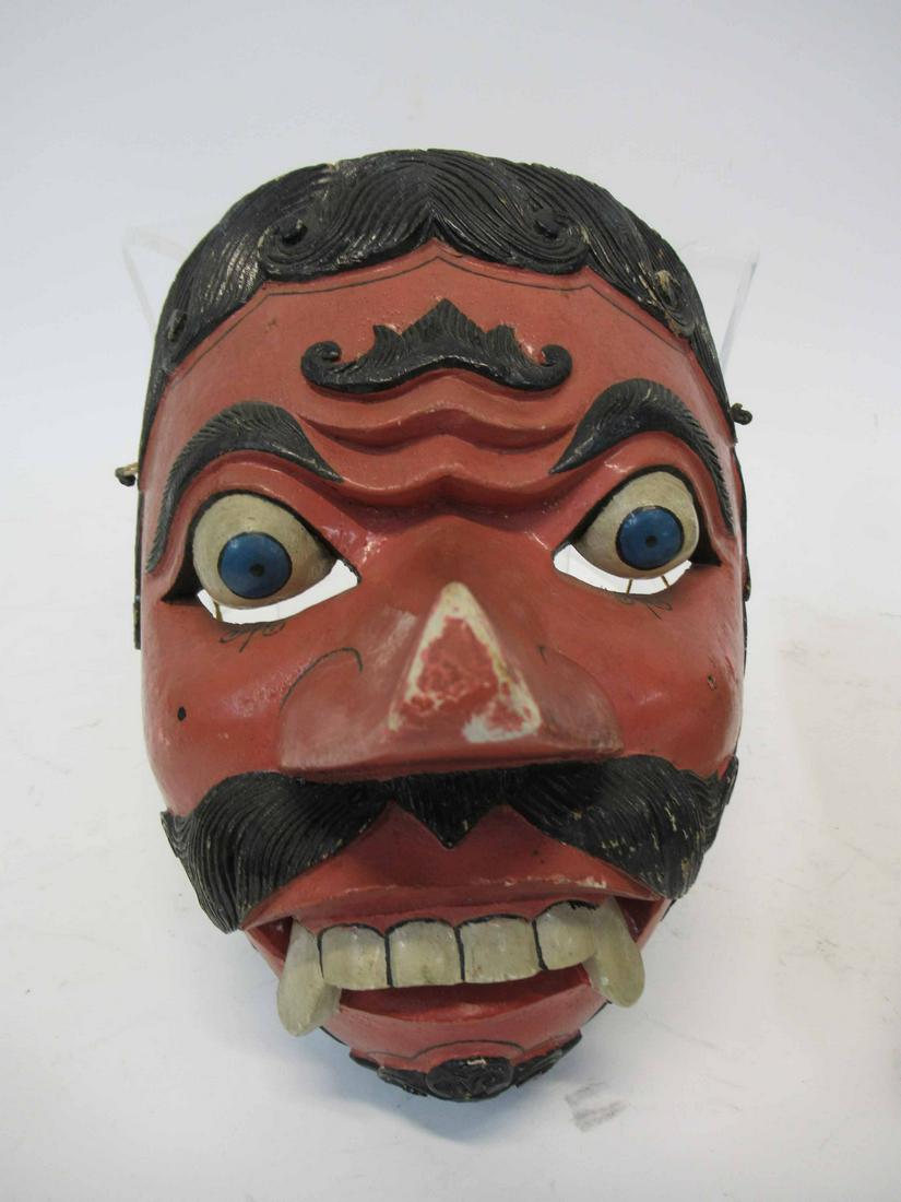 Two Polychrome Peruvian Masks