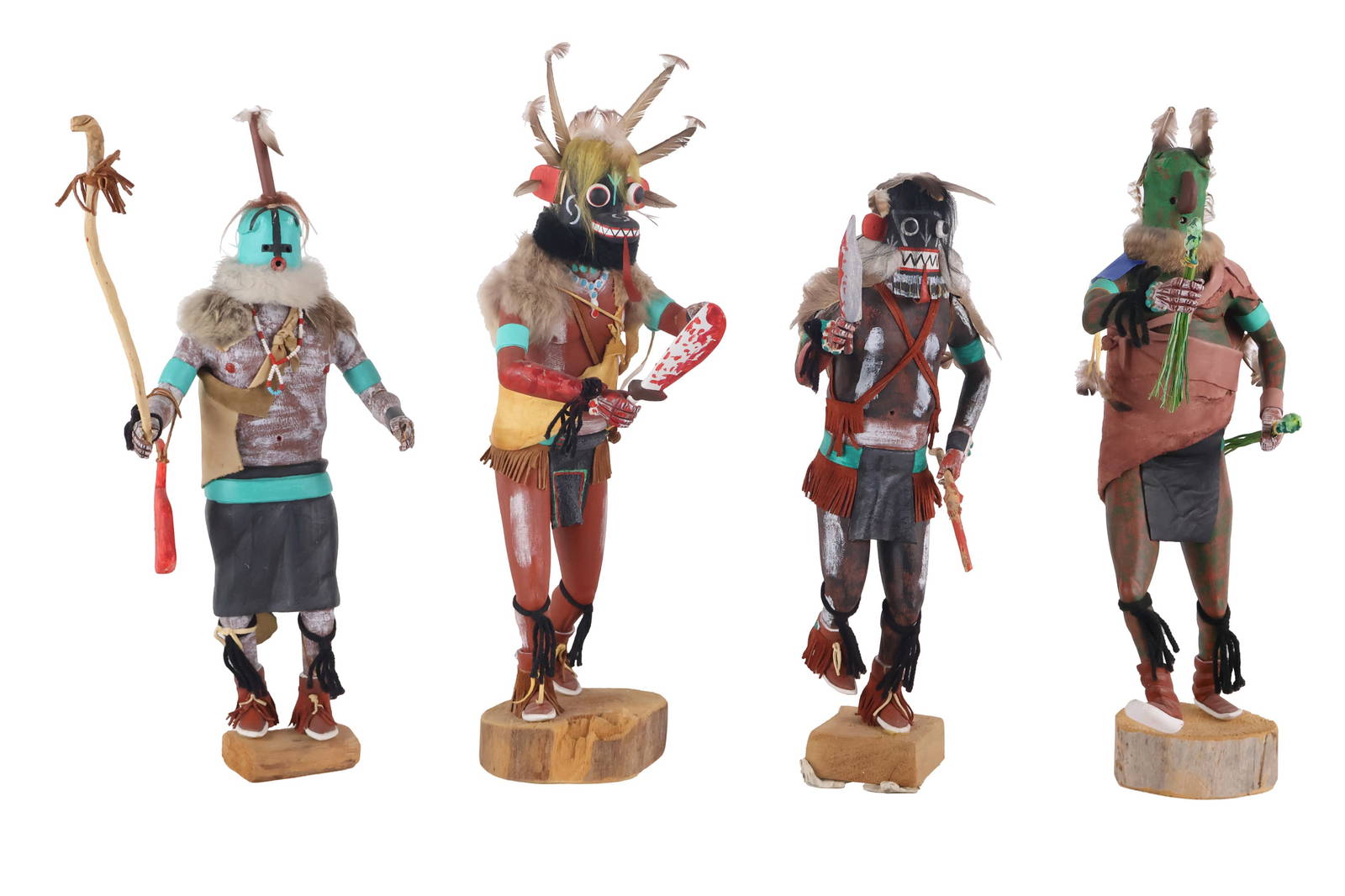 Four Painted And Carved Kachina Dolls Auction