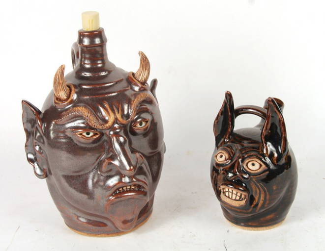 Two Karen Labarga Devil Face Jugs