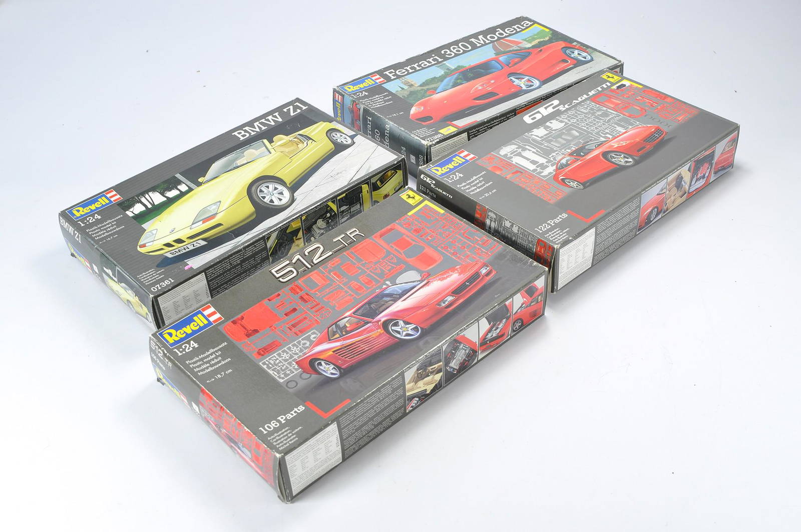 A Group Of 1/24 Scale Model Cars And Racing Kits Comprising Revell Bmw ...