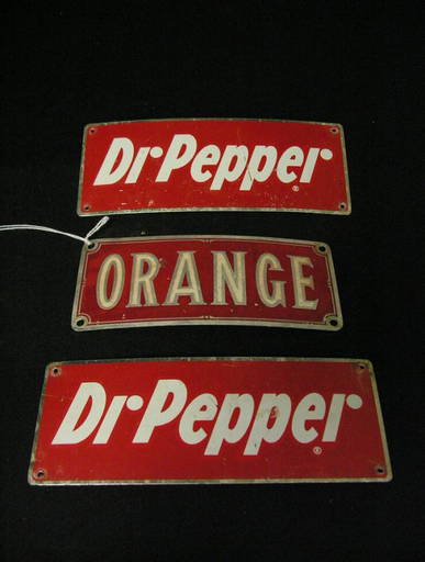 Two Dr. Pepper Signs