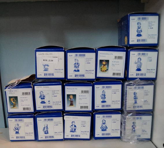 15 Boxed Hummel Figures & Display Shelf
