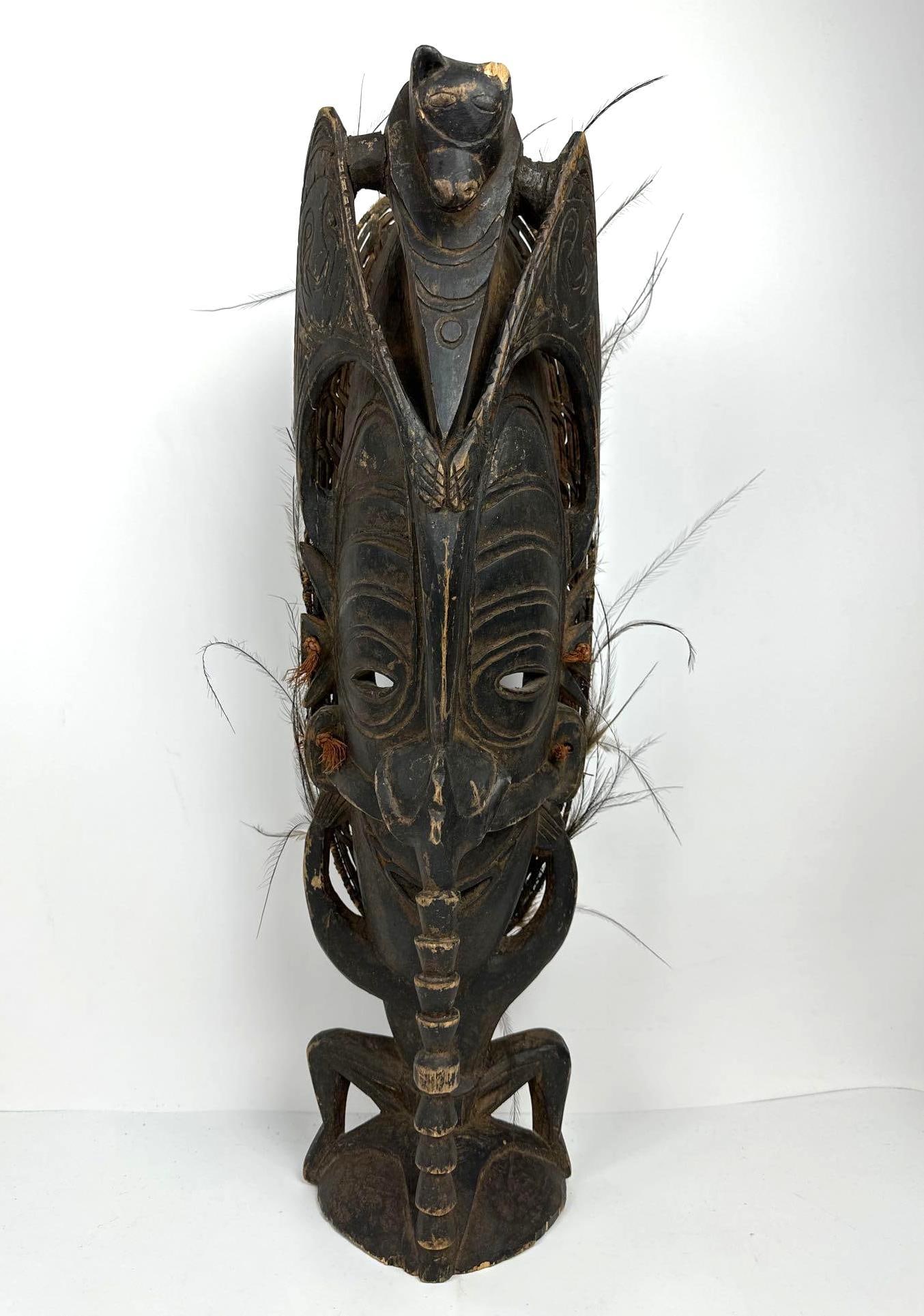 Buy Antique Papua / New Guinea Bat Mask W/feathers | Cornell Auctions ...