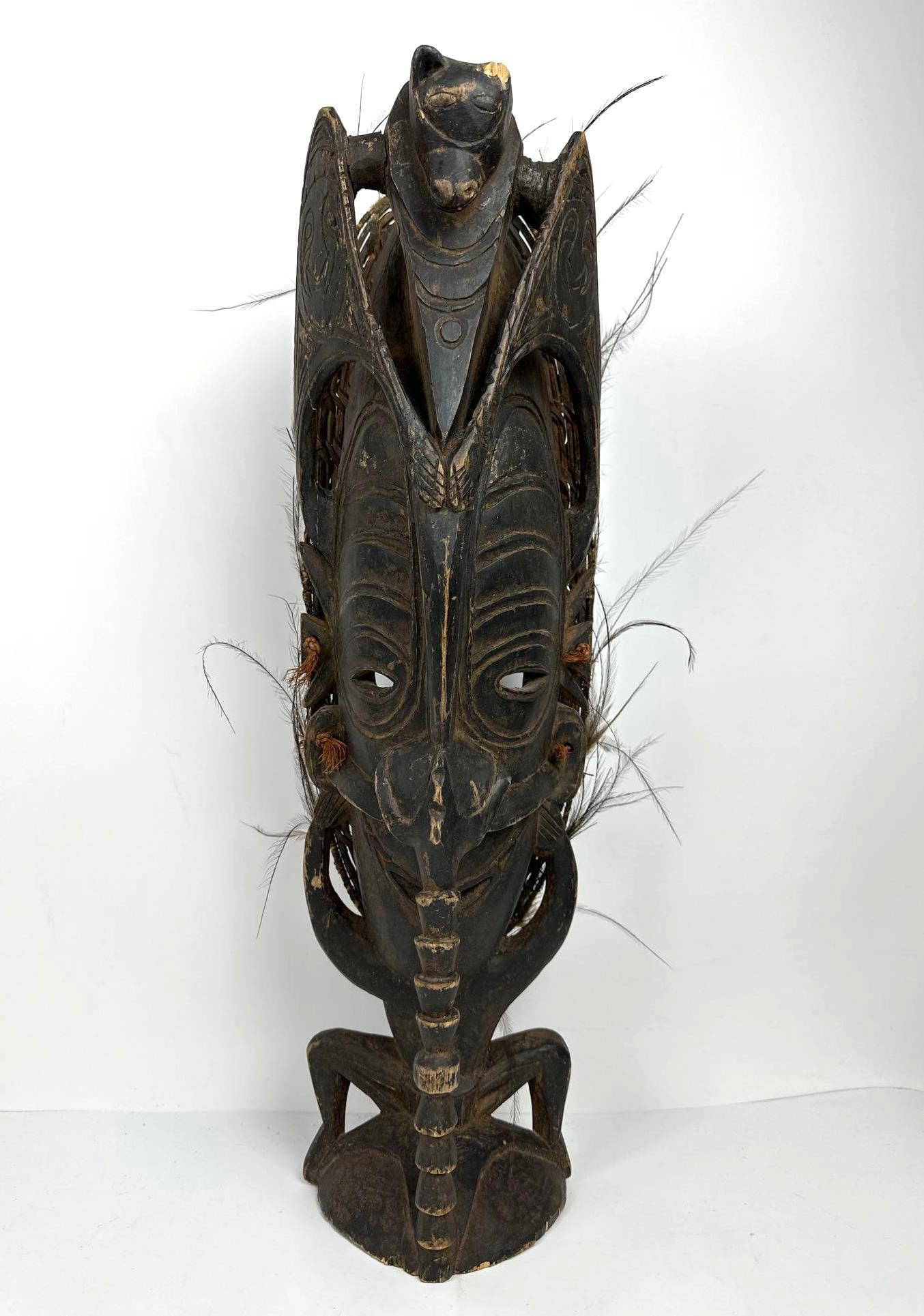 Buy Antique Papua / New Guinea Bat Mask W/feathers | Cornell Auctions ...