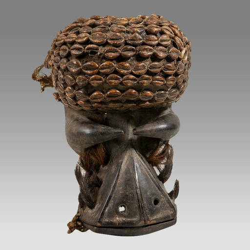 African Ivory Coast Wooden Mask With Shells.