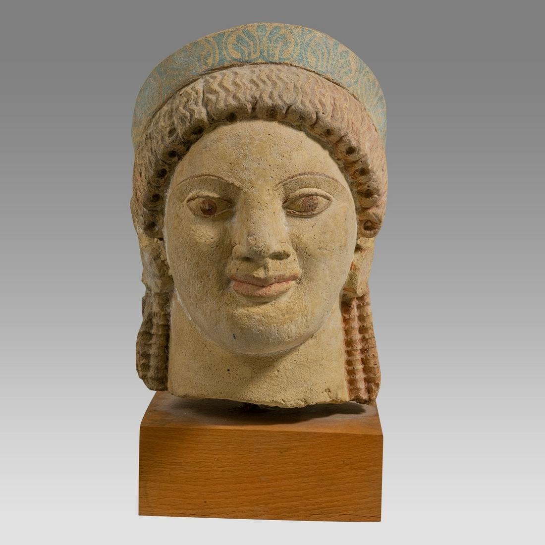 Cypriot Greek Kore Style Limestone Head.
