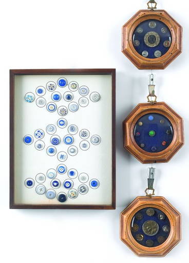 Collection Of Framed Buttons.