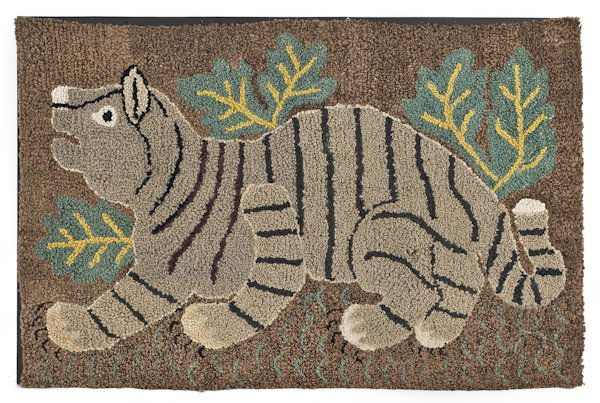 Hooked rug of a tabby cat, 20th c., 24'' x 37''.
