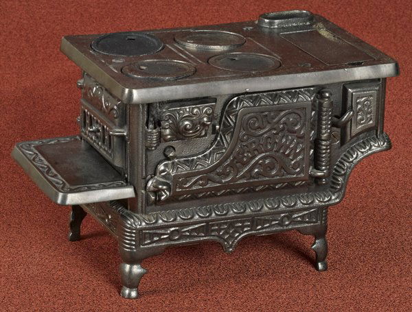 Grey Iron cast iron Crown toy stove, 6 3/4'' h.,