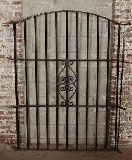 Seven Matching Arched Iron Window Guards. Could Be