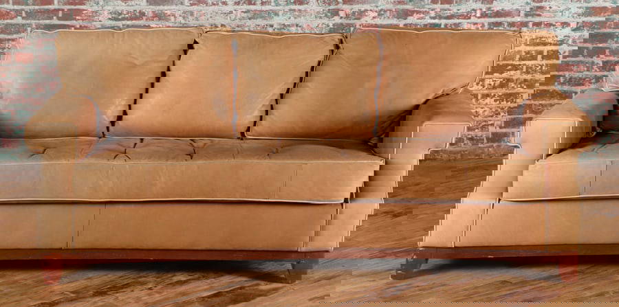 A Labeled Thomasville Leather Sofa Having Button Decoration On Seats ...