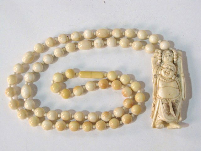 191: CHINESE CARVED IVORY BUDDHA NECKLACE