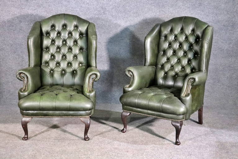 Pair Leather Tufted Wing Back Chairs