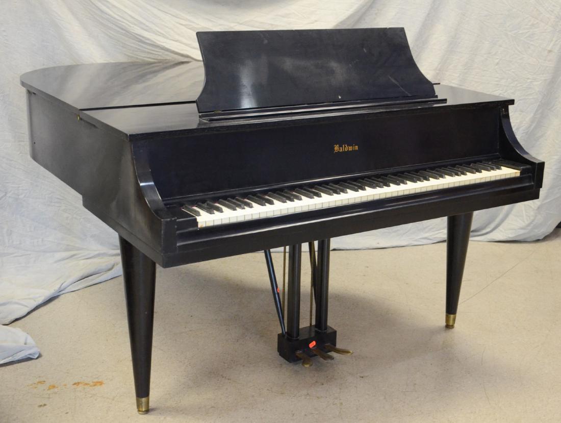 Black lacquer Baldwin baby grand piano