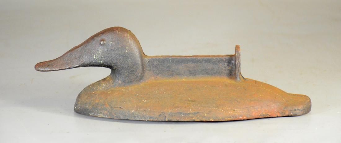 Cast iron duck boot scraper, 15" long, 5" high