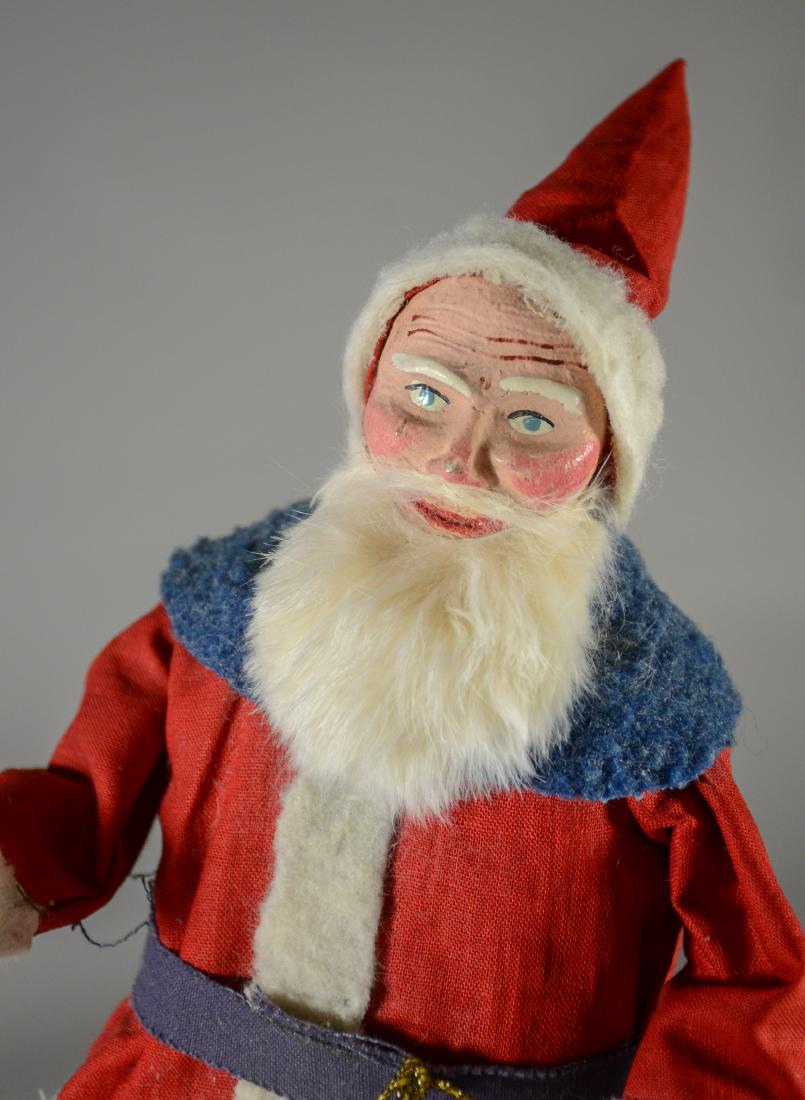 Santa Claus riding goat pull toy with fur, horns,