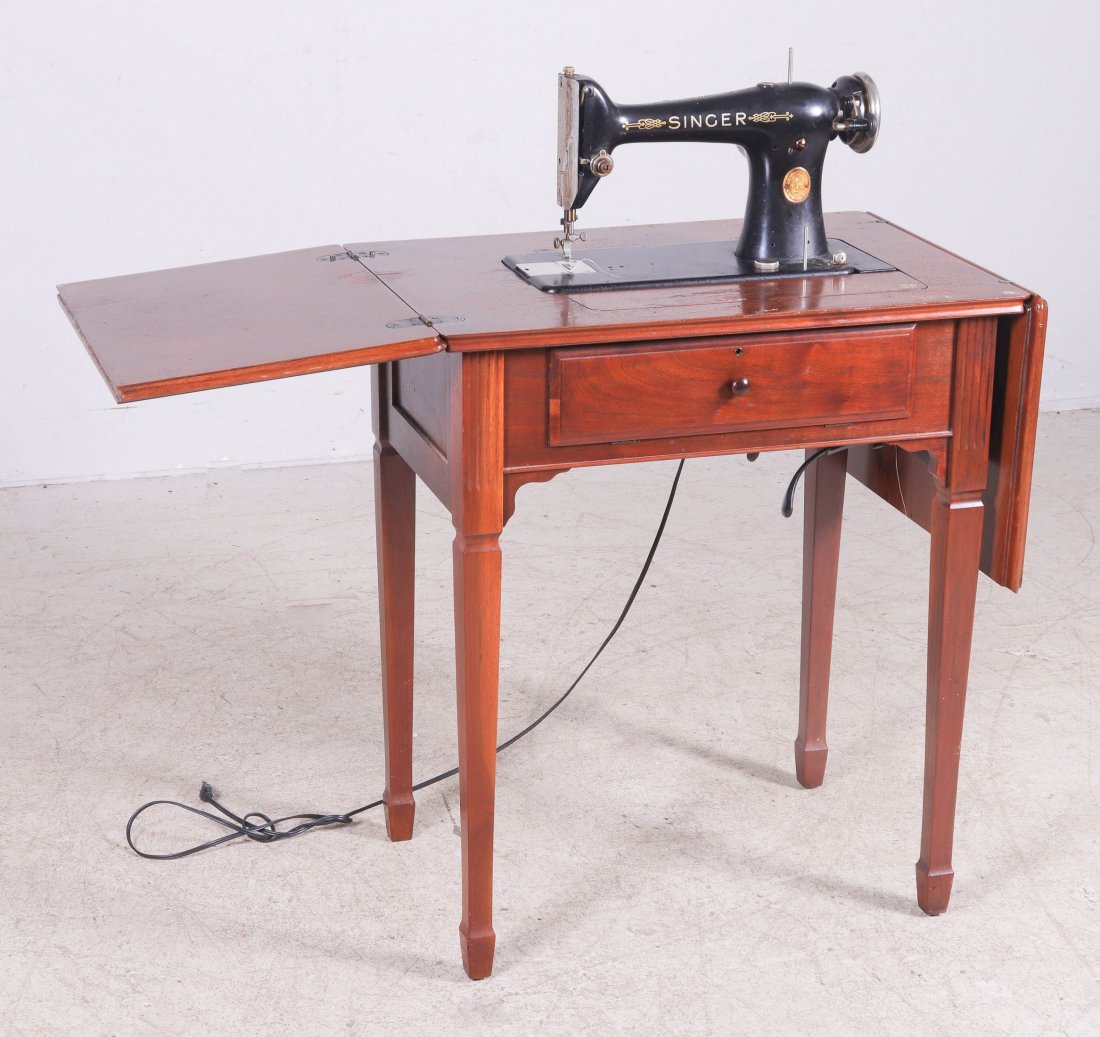 Singer Sewing Machine In Walnut Stand