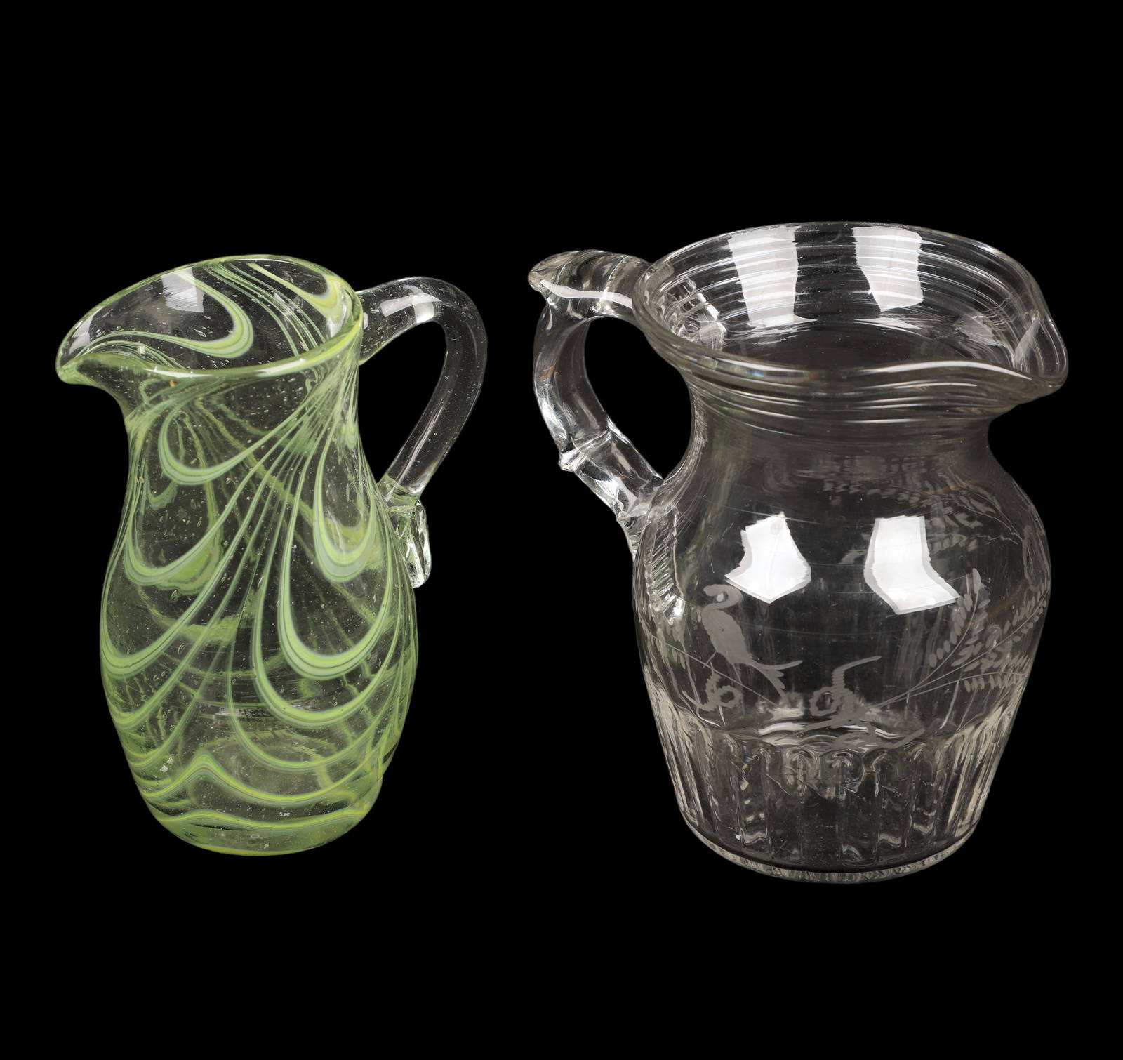 (2) Blown Glass Pitchers Auction