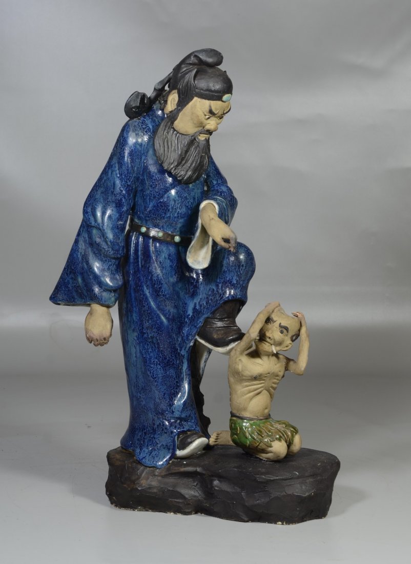 Chinese Shiwan pottery figural group, Zhong Kui the