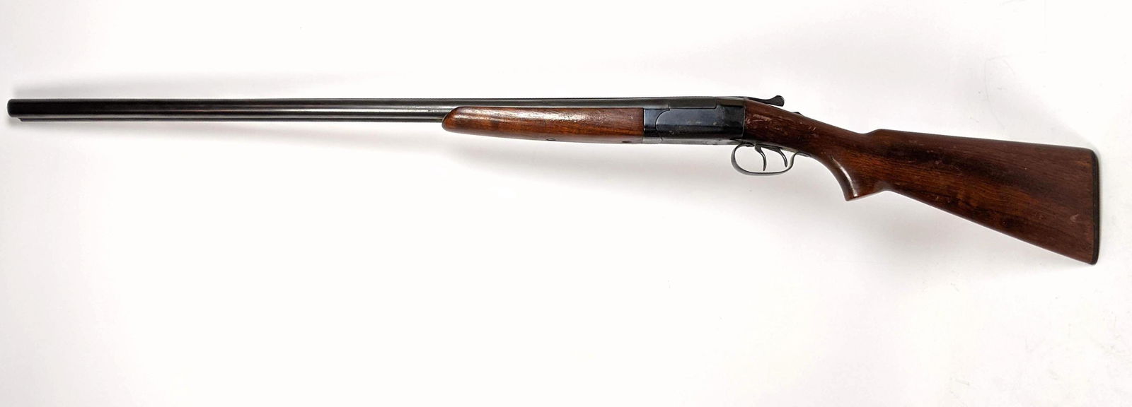 Winchester Model 24 Twelve Gauge Double Barrel Shotgun.