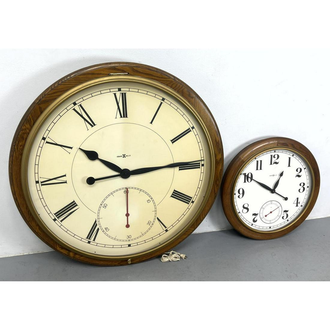 2pcs Howard Miller Wall Clocks. Oversized. Oak Frames. Auction