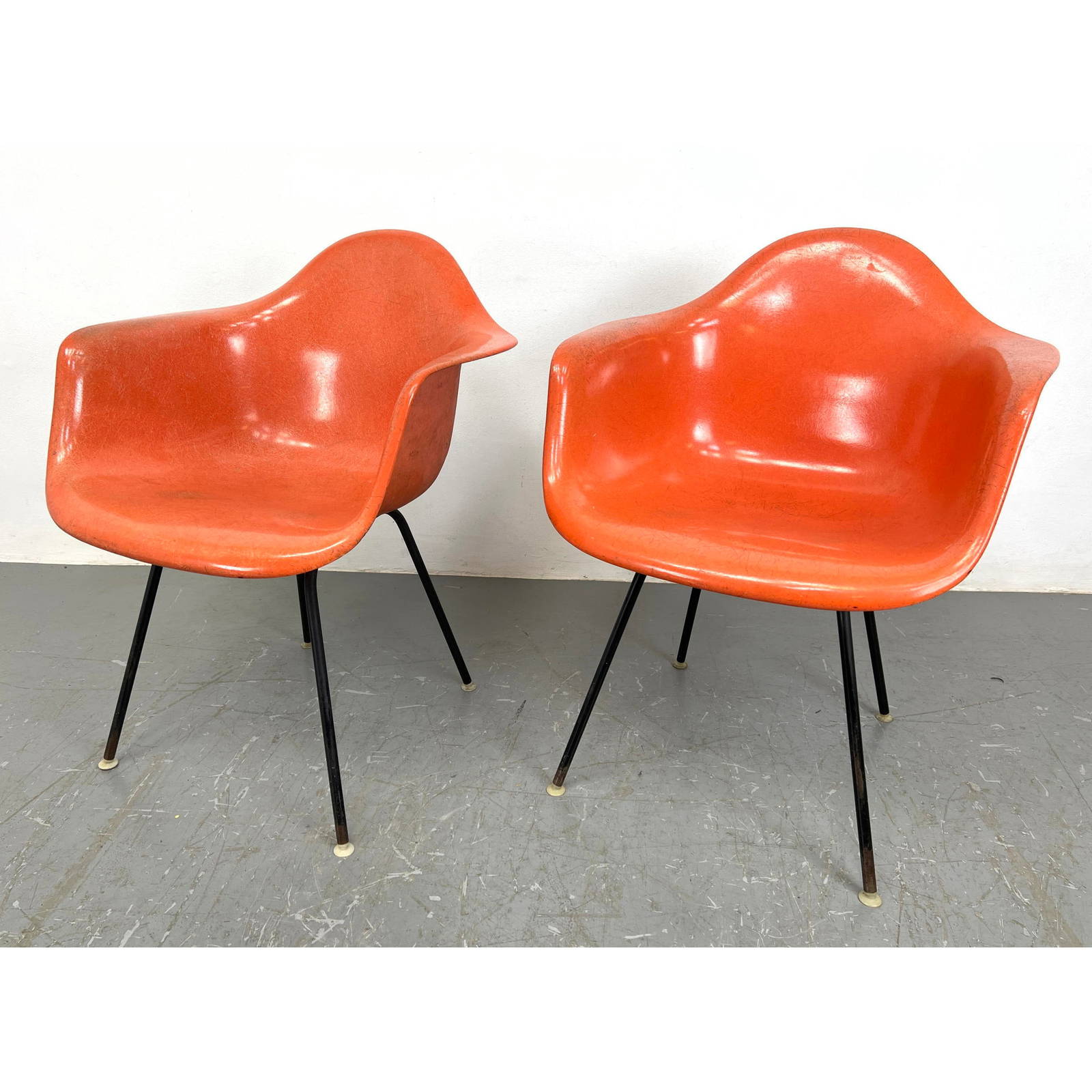 Charles Eames Herman Miller Shell Arm Chairs. Orange/red Auction