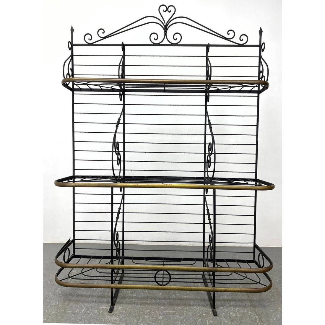 Tall Iron And Brass Bakers Rack. Scroll Design With Heart Crest. Auction