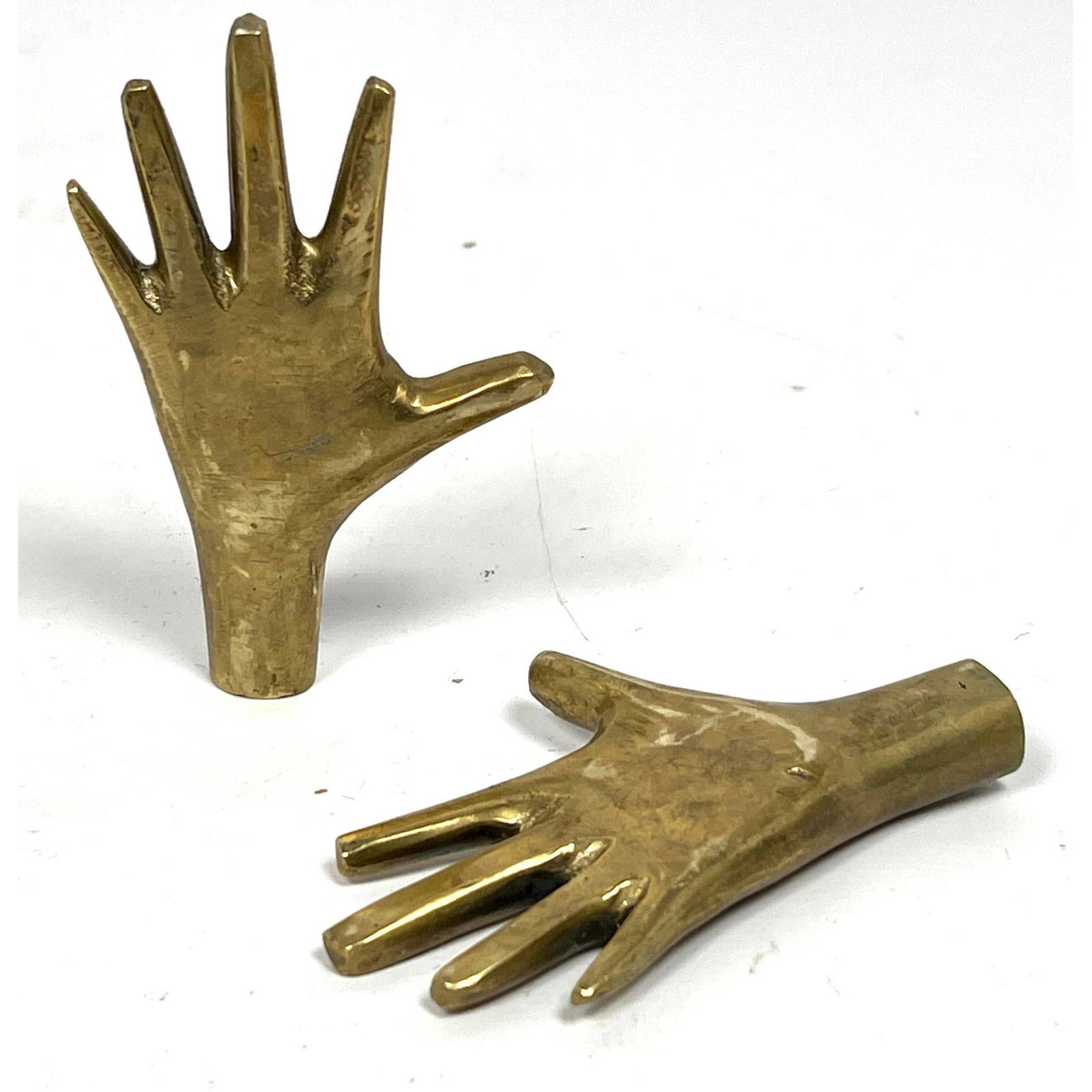 Pair After Aubock Brass Hand Paperweights. Auction