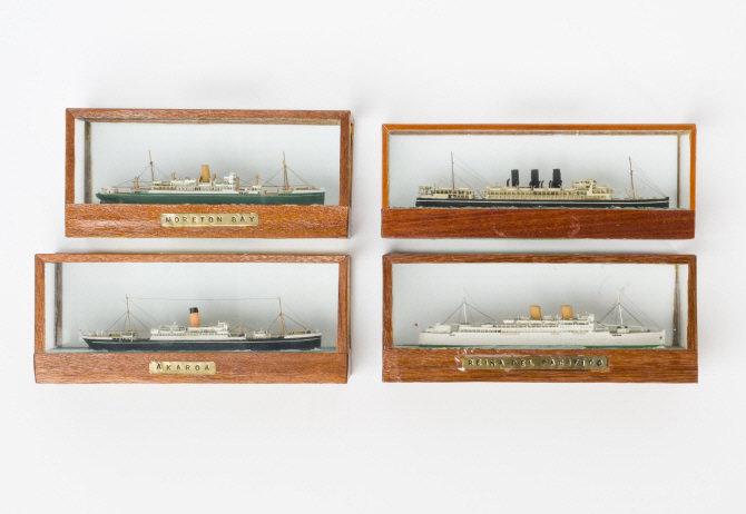 Glass Cased Miniature Models Of Ocean Vessels