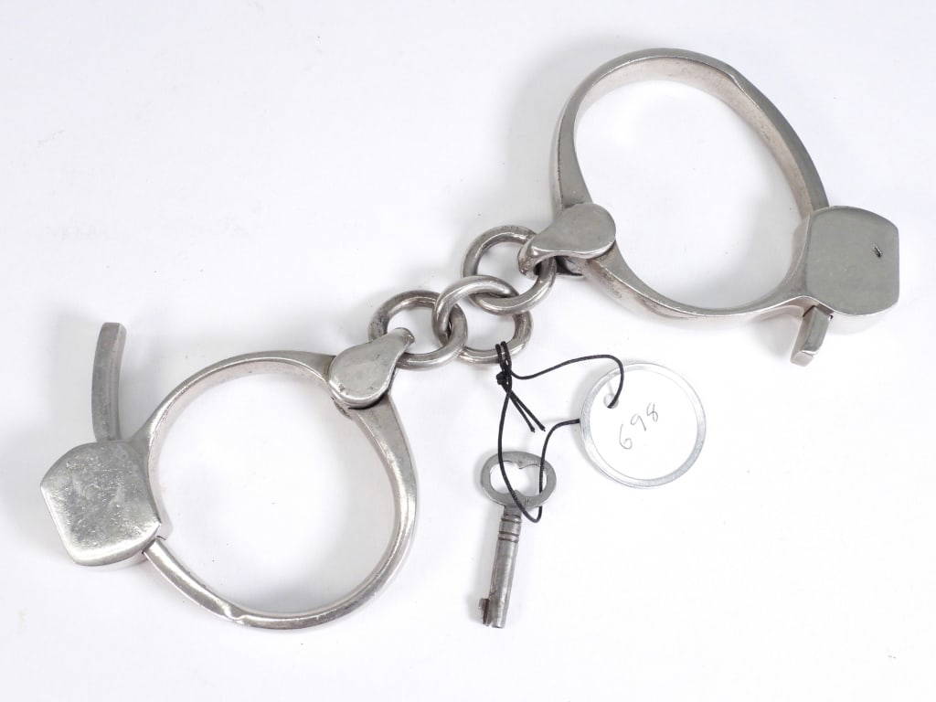 Tower Detective Model Nickel Plated Handcuffs Auction