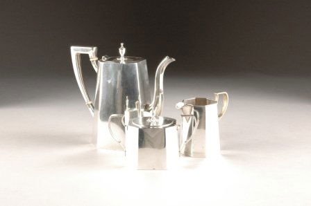 17: A CARTIER STERLING SILVER PARTIAL TEA SERVICE, 8646
