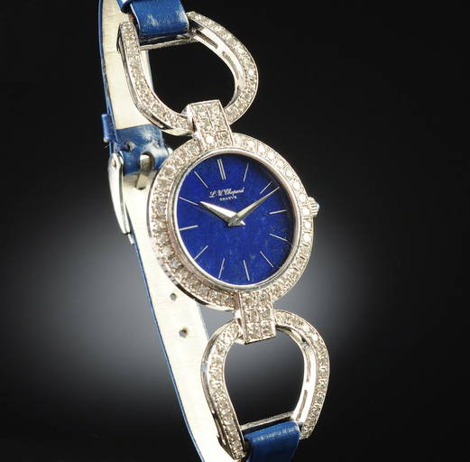 An 18k Gold Lu Chopard Geneve Lady's Wristwatch, In Whi