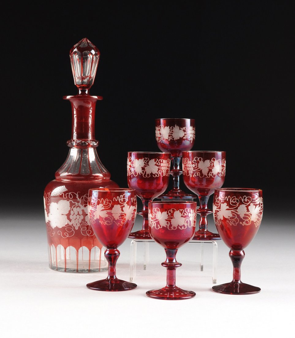 A GROUP OF SEVEN BOHEMIAN RUBY CUT TO CLEAR GLASS