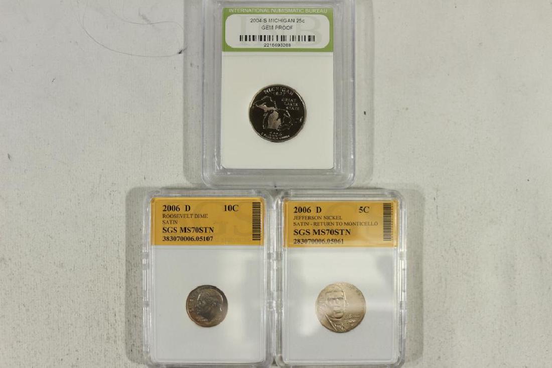 3 Slabbed Coins See Description
