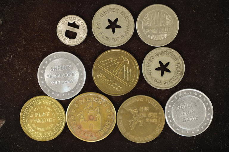 10 ASSORTED METAL TOKENS INCLUDES: ELECTRIC (#0016) on Jan 02, 2023 ...