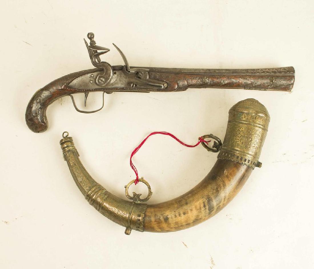 North African Flintlock Pistol with large powder horn.