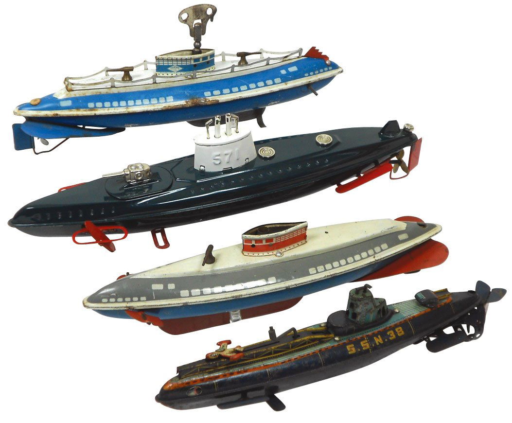 1065: Toy boats (4), metal submarines, S.S.N. 38 tin wi