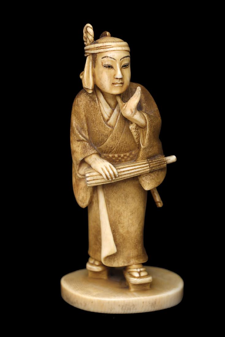 6: Japanese carved ivory figure, carpenter