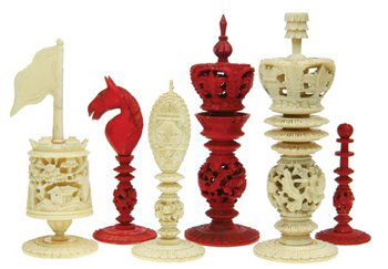 221E: A "BURMESE PATTERN" IVORY CHESS SET, c. 1810