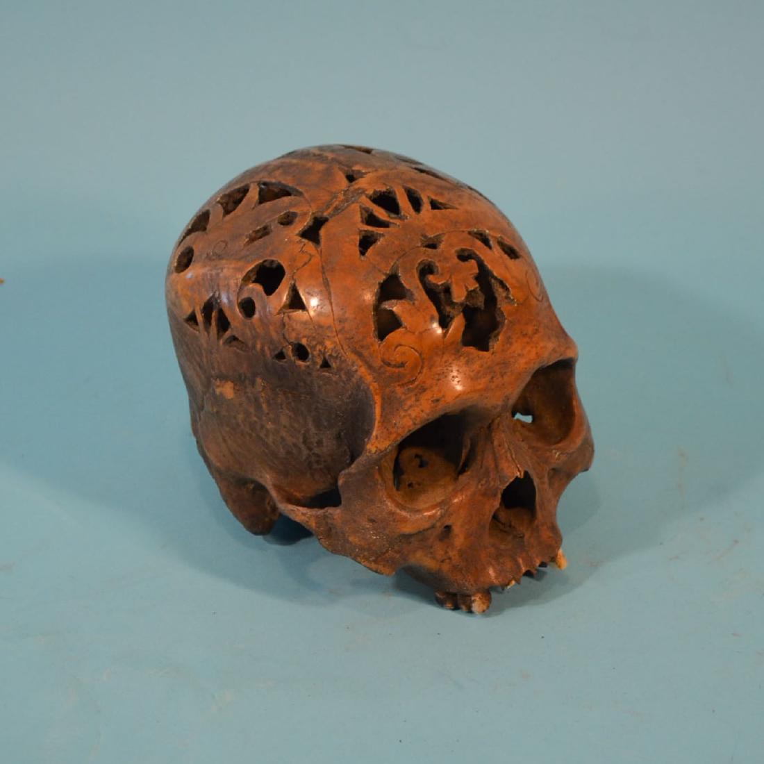 An incised Dayak trophy skull, Borneo approximately 18c - Jun 20, 2013 ...
