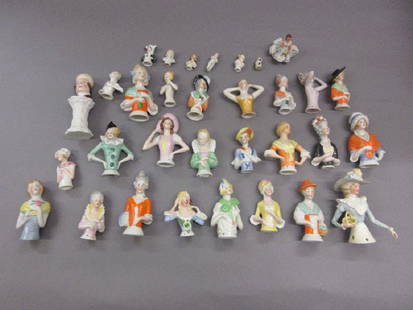 Two Miniature Porcelain Dolls