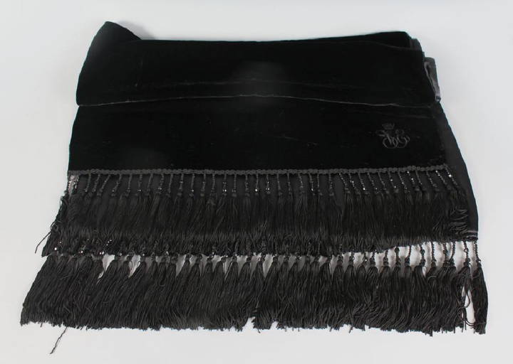 A Black Orient Express Cape.