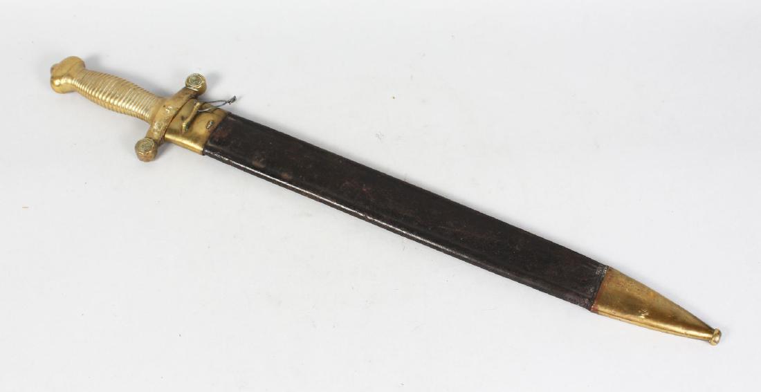 AN EARLY HEAVY SHORT SWORD, with brass handle in a