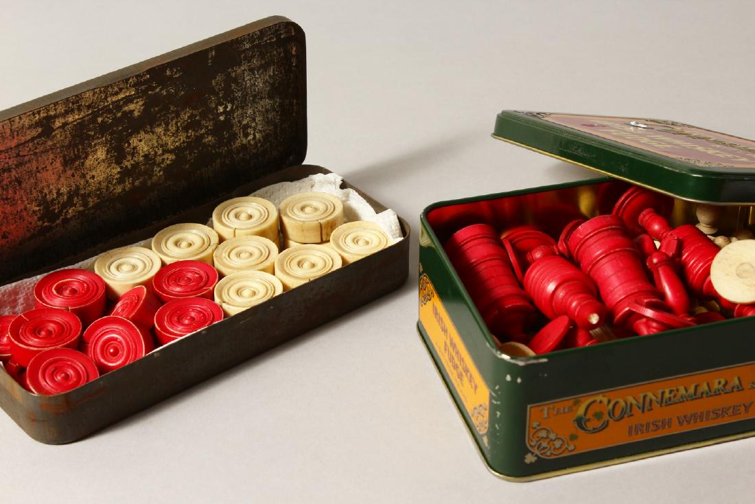 A BONE CHESS SET, and similar draught counters.