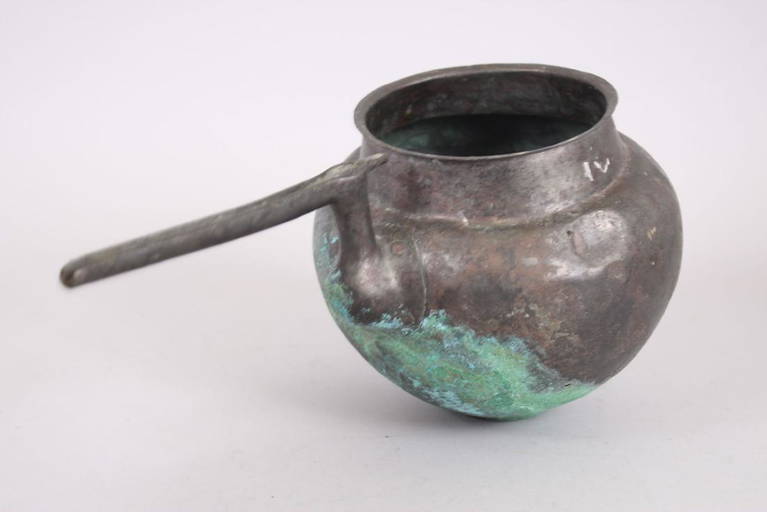 An Ancient Persian Metal Spouted Pot With Unusual Leg